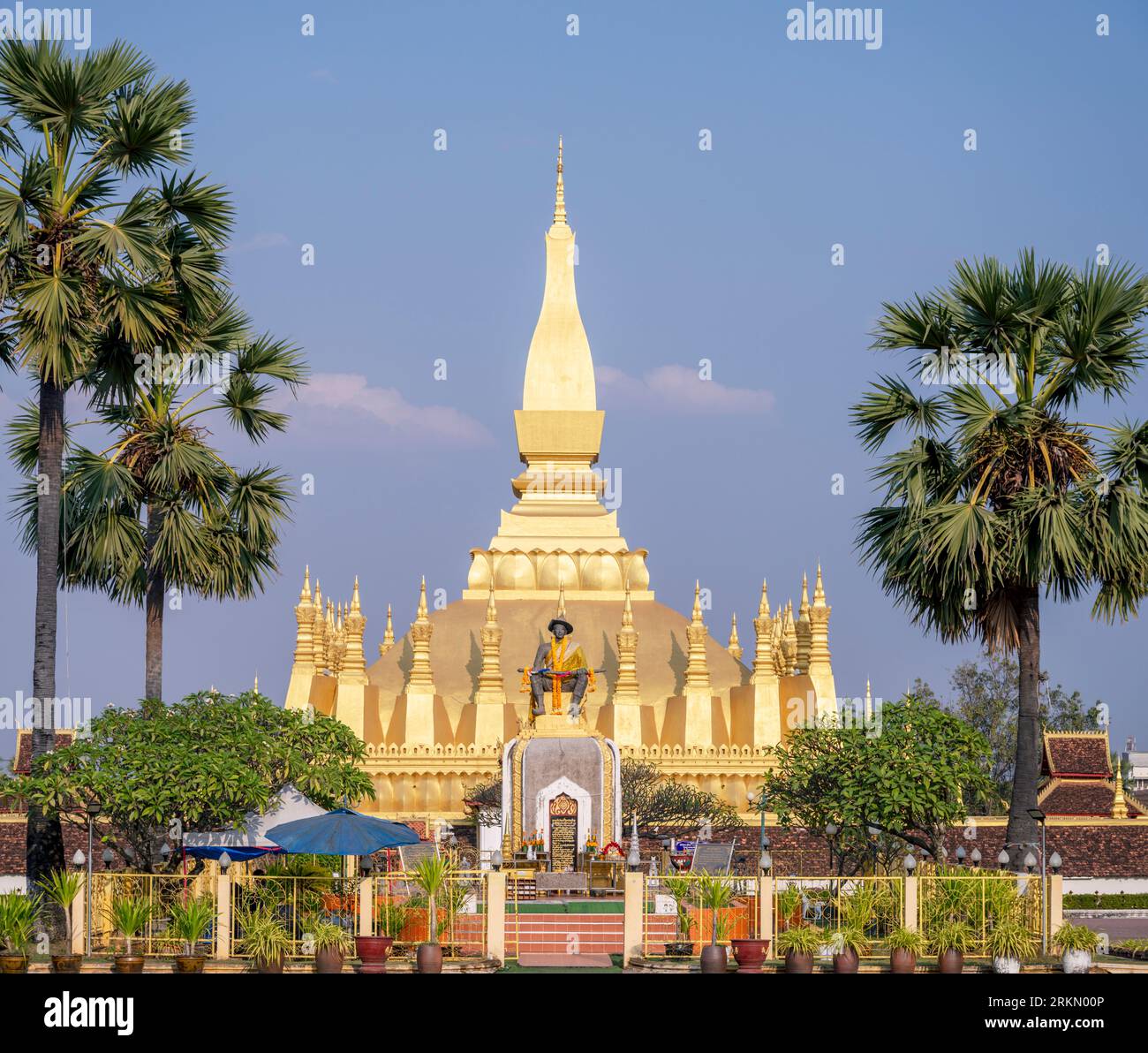 Near the entrance,statue of ancient King Setthathirat,the Stupa ...
