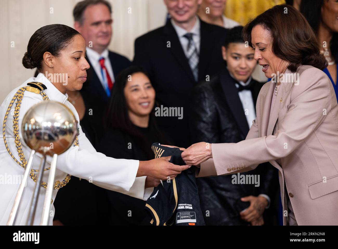 Washington, USA. 25th Aug, 2023. Vice President Kamala Harris hands a ...
