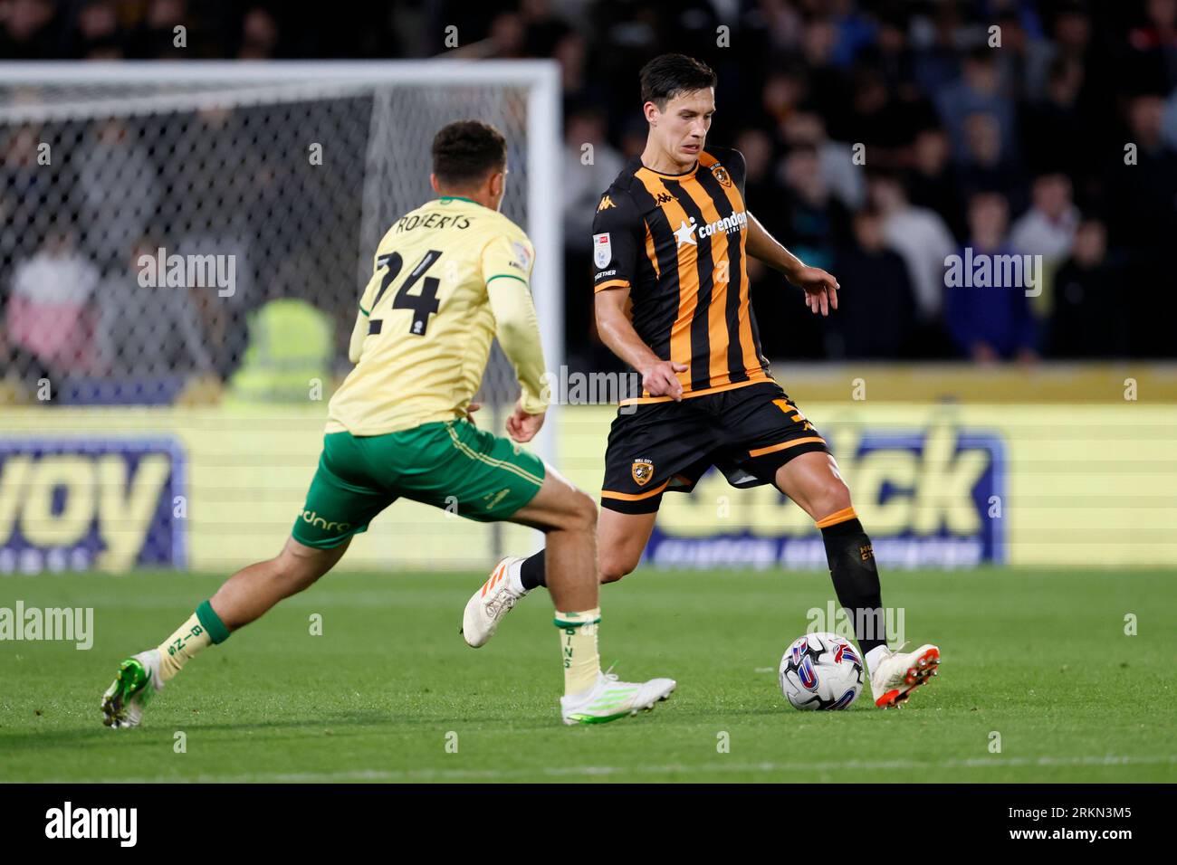 Hull City's Alfie Jones (right) and Bristol City's Haydon Roberts in ...