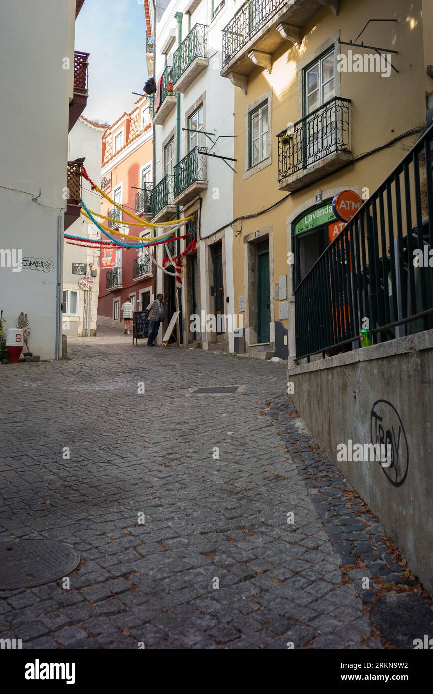 view of the streets of the Alfama neighborhood is one of the oldest and ...