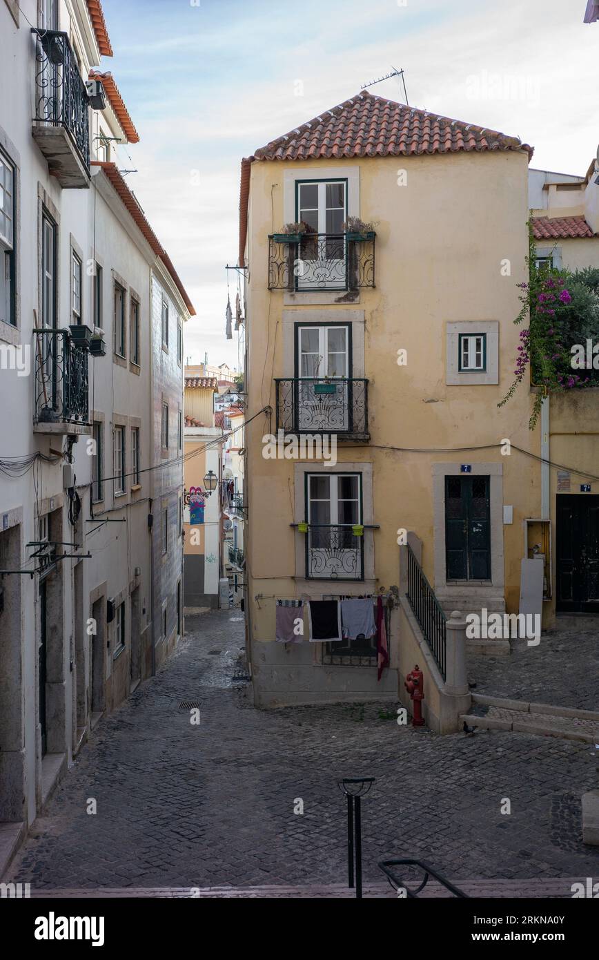 view of the streets of the Alfama neighborhood is one of the oldest and ...