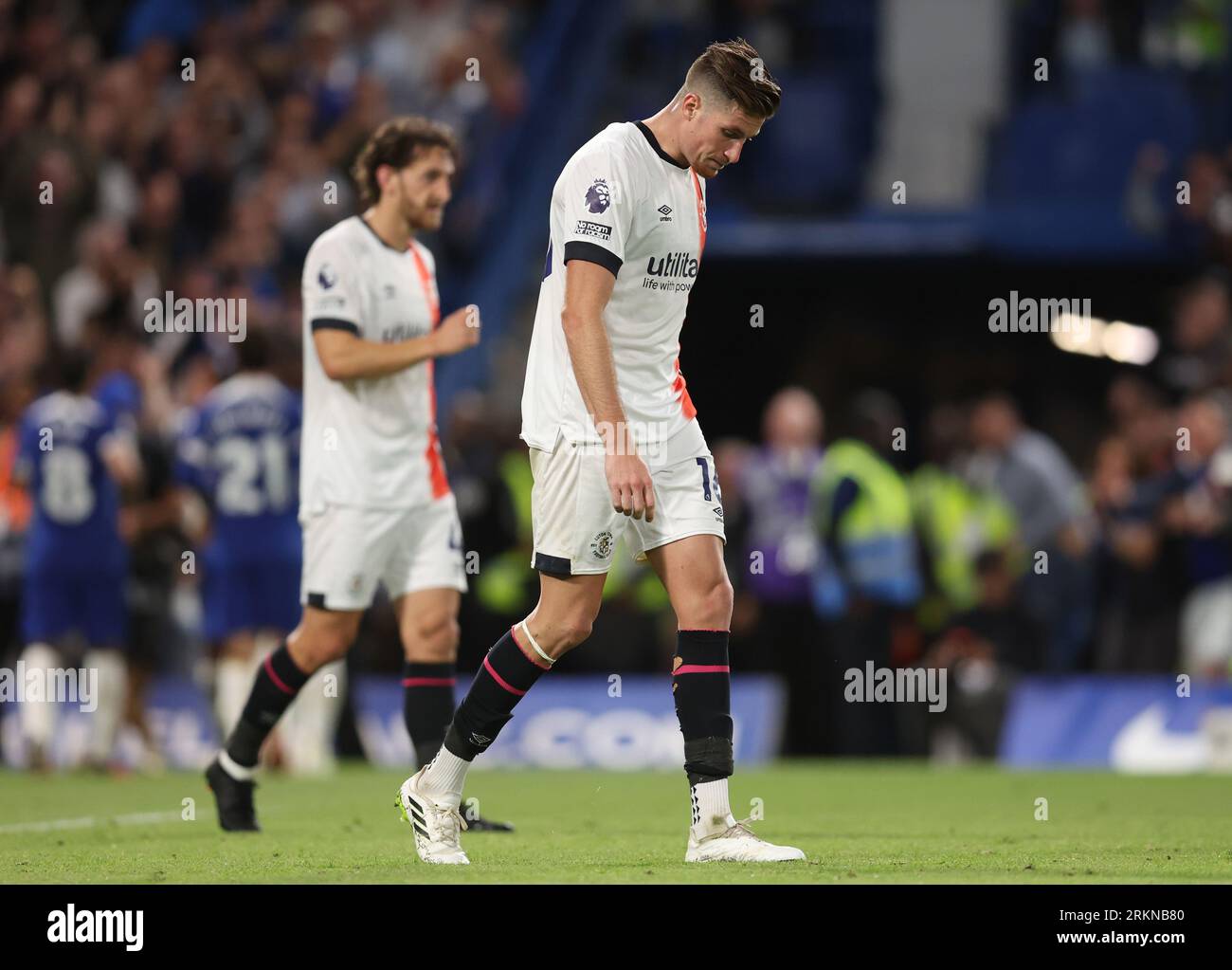 London, UK. 25th Aug, 2023. Reece Burke of Luton Town looks dejected ...