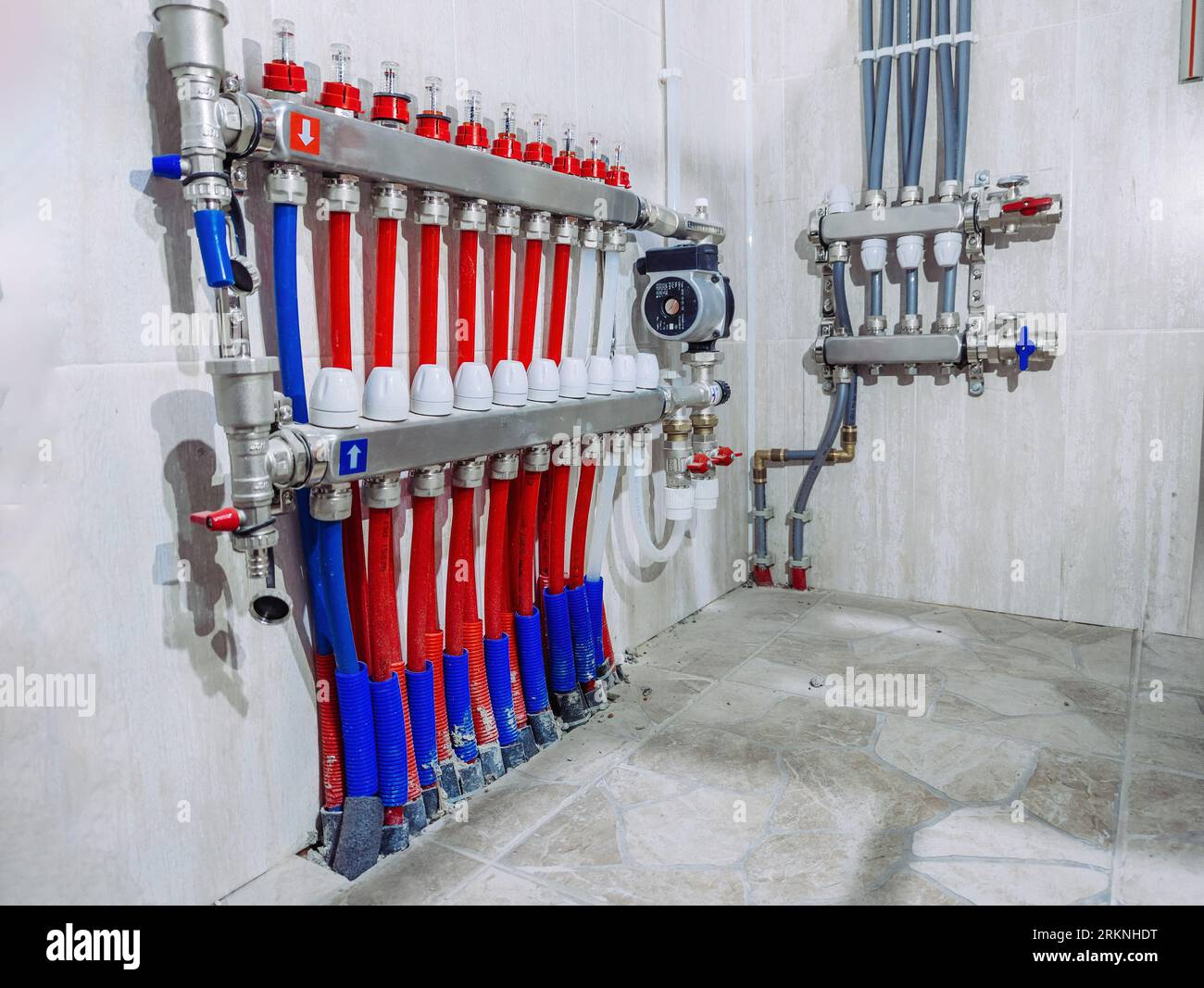 Pipeline connection of modern heating system Stock Photo - Alamy