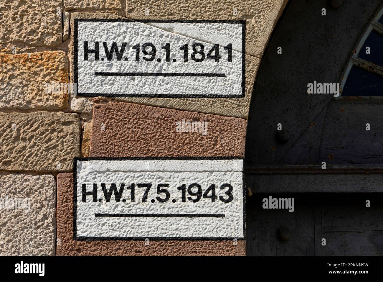marked flood levels on a wall as a reminder and warning, Germany, Lower ...