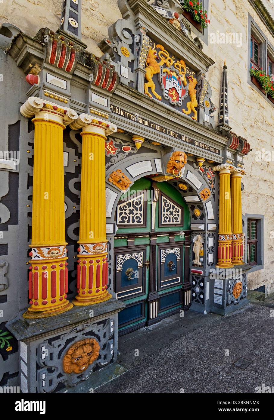 main portal with colourful woodcarving on the town hall, Weser ...