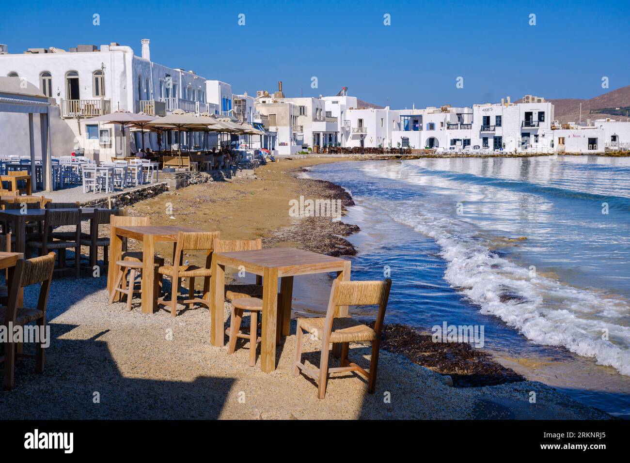 Naousa, GR - 2 August 2023: Restaurant tables on the waterfront on ...