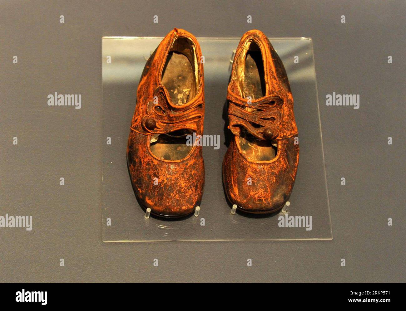 Shoes of the unknown child titanic hi-res stock photography and images ...