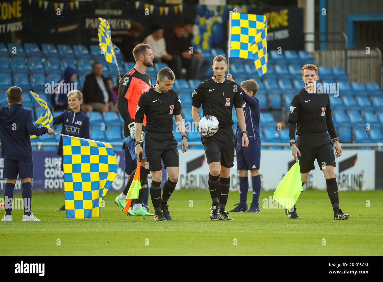 Armco Arena, Solihull, UK, 25th Aug 2023, referees enter pitch during ...