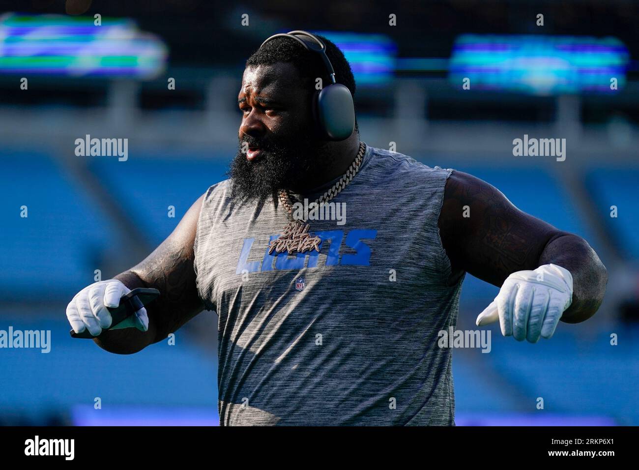 Detroit Lions defensive end Isaiah Buggs warms up before a preseason ...