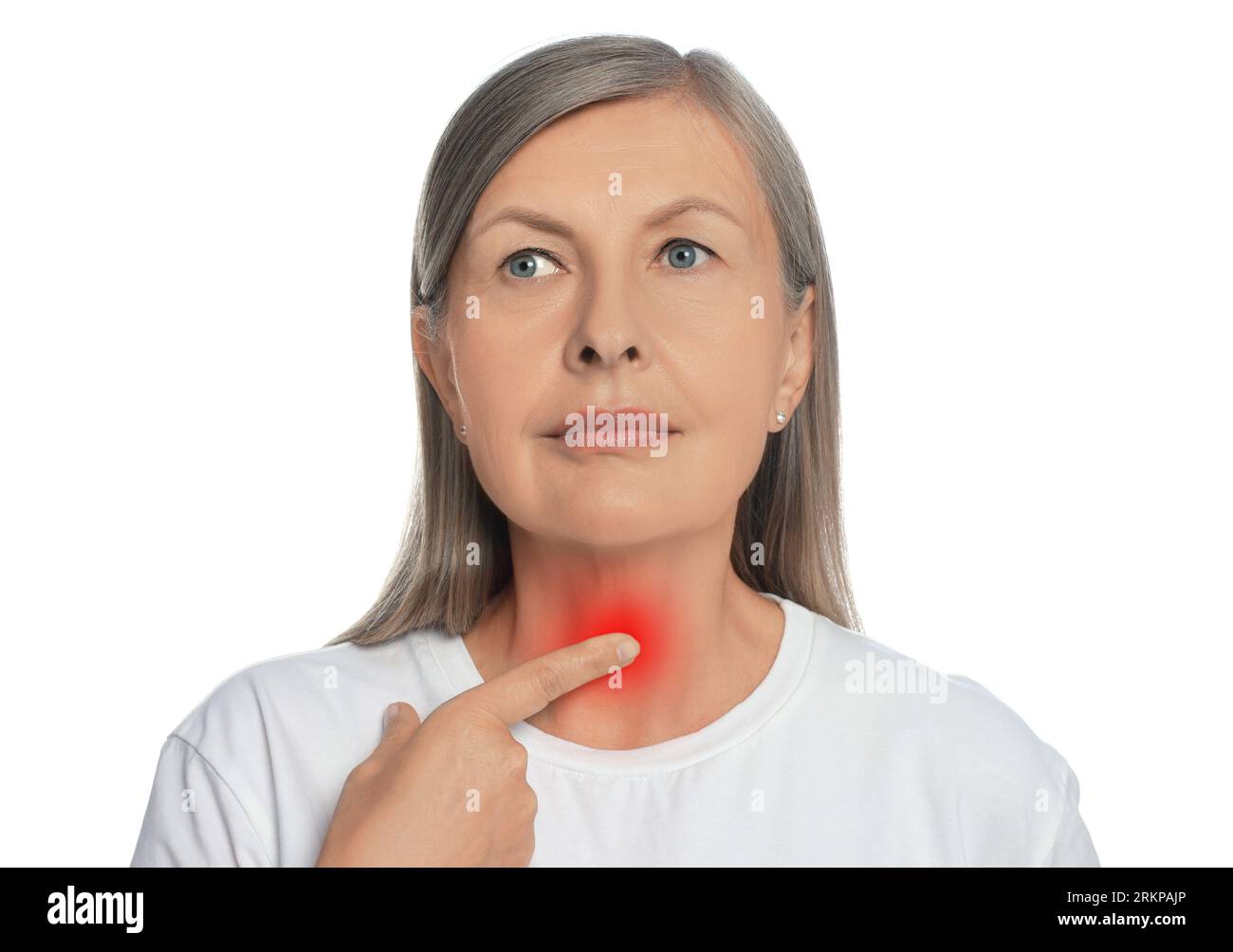 Endocrine system. Senior woman doing thyroid self examination on white ...
