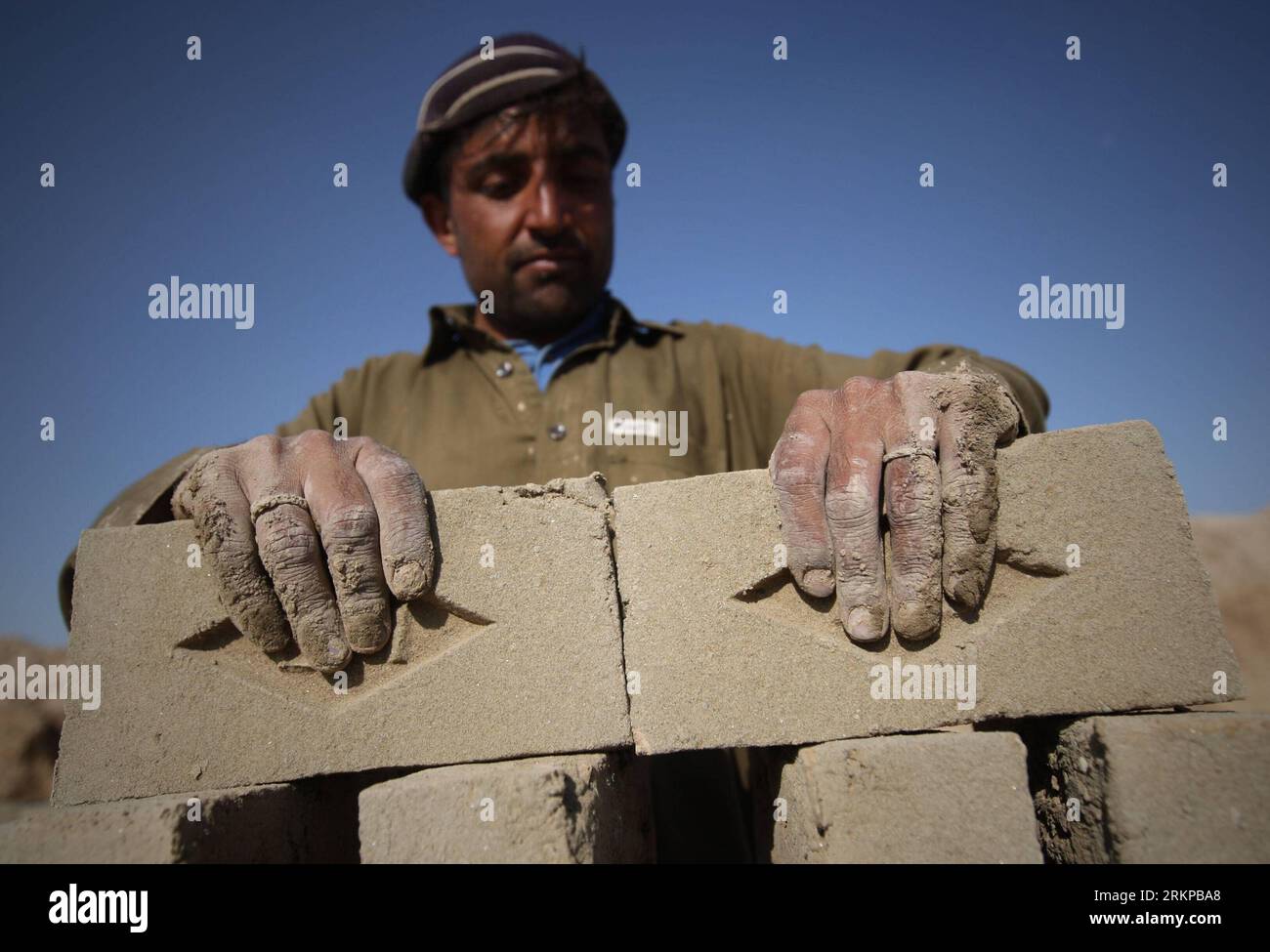 Factory worker afghan hi-res stock photography and images - Alamy