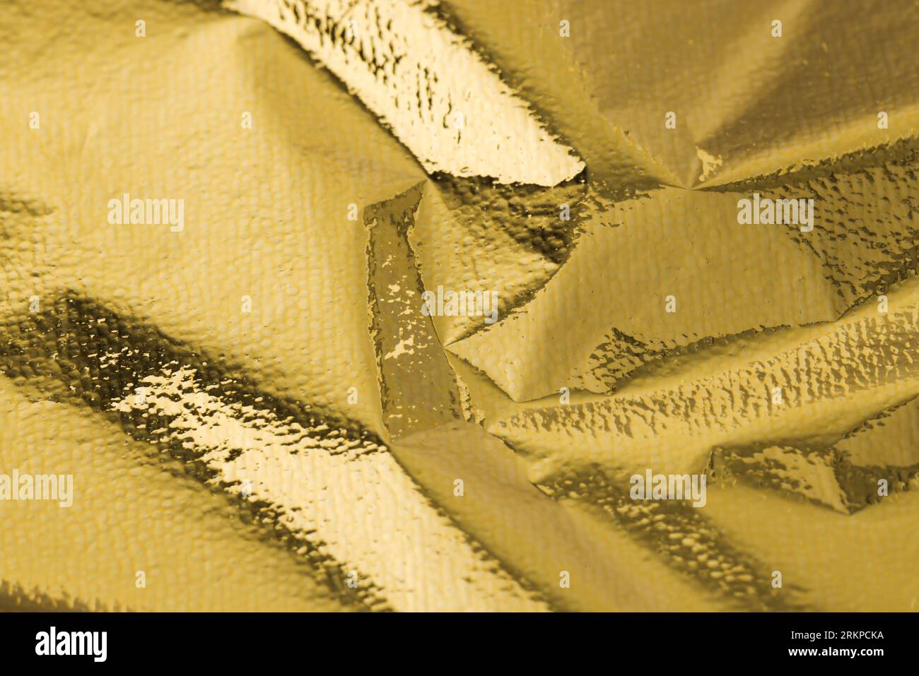 Edible gold leaf sheet as background, closeup Stock Photo - Alamy