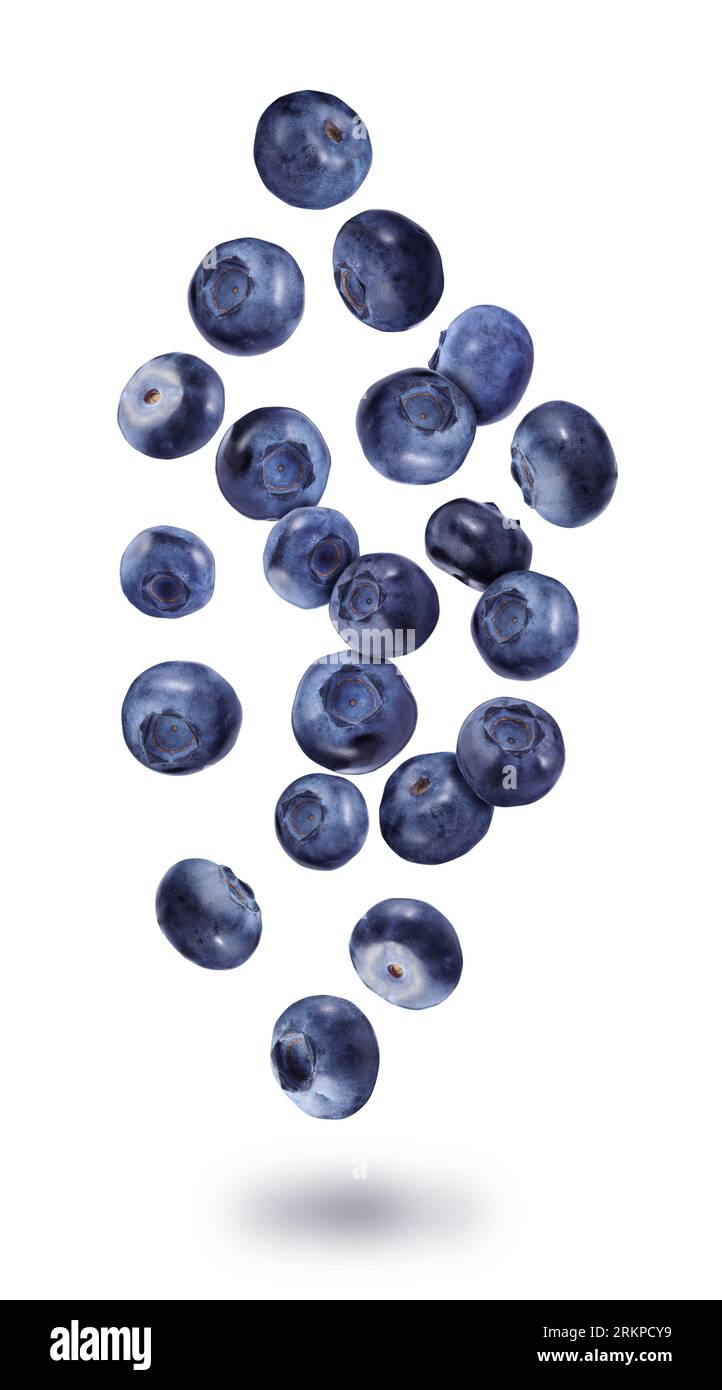 Many ripe blueberries falling on white background Stock Photo - Alamy