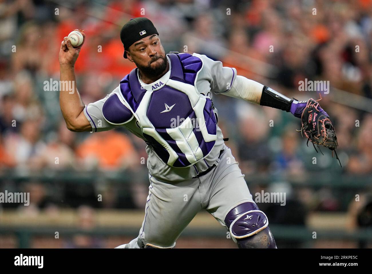 Colorado Rockies catcher Elias Diaz throws to first base to put out ...