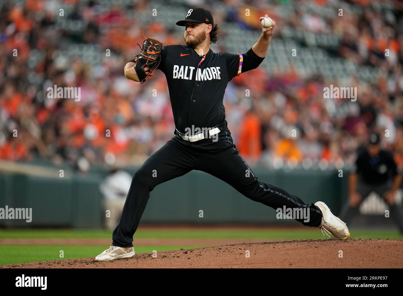 Baltimore Orioles starting pitcher Cole Irvin throws to the Colorado ...