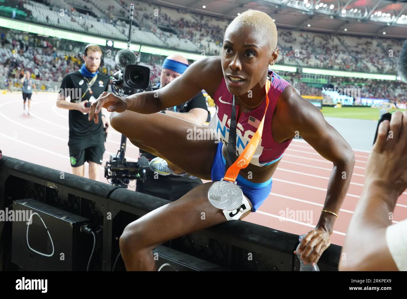 Shamier Little (USA) jumps over the boarding for seeing her friends after 400m hurdles women ...
