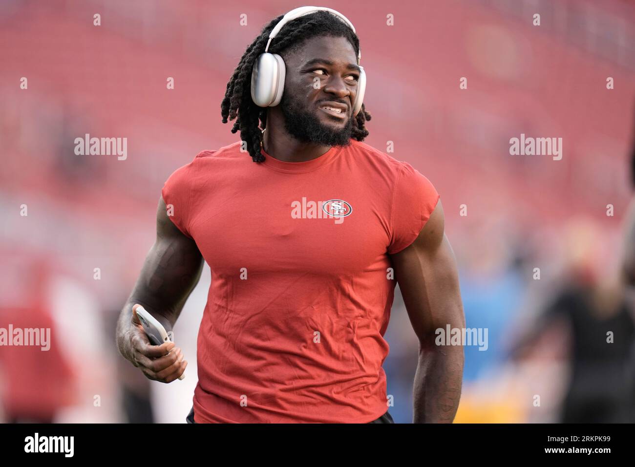 San Francisco 49ers wide receiver Brandon Aiyuk warms up before a ...