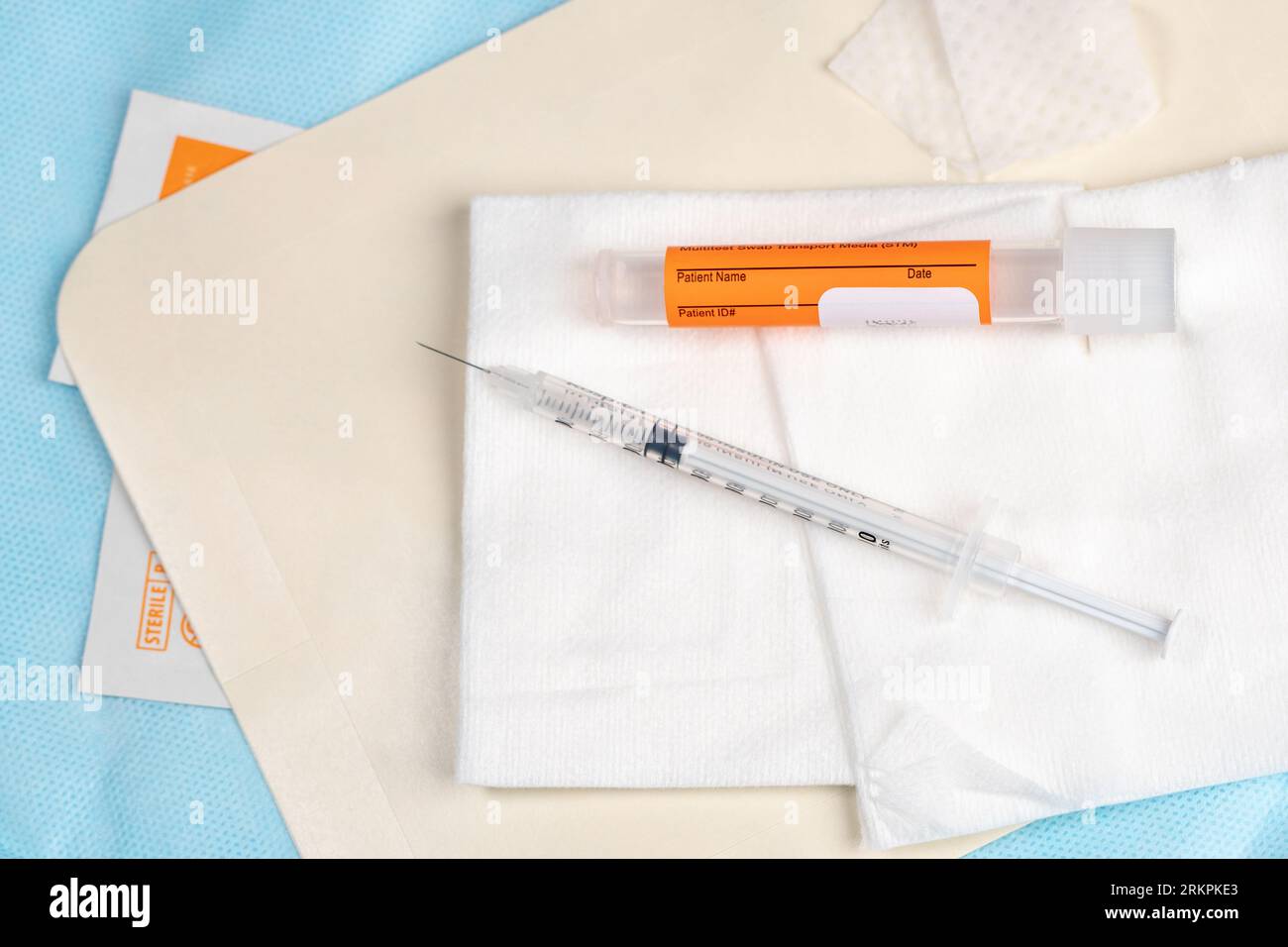 Syringe and test sample bottle Stock Photo - Alamy