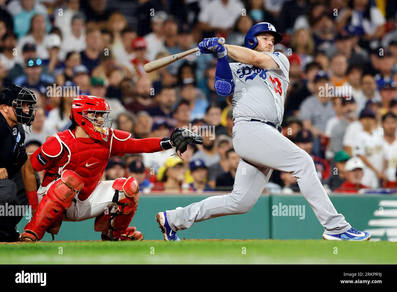 Los Angeles Dodgers' Max Muncy follows through on a two-run double in ...