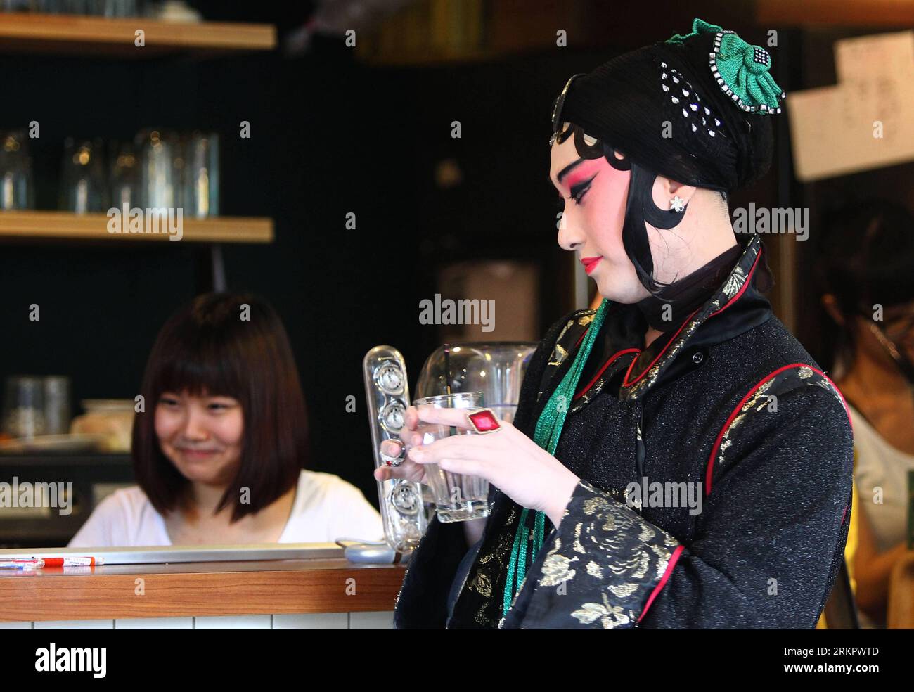 Cangue hi-res stock photography and images - Alamy