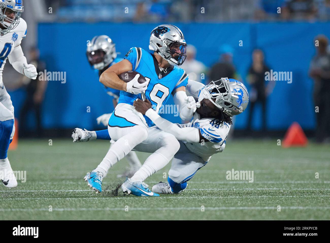 Carolina Panthers wide receiver Adam Thielen (19) is tackled by Detroit ...