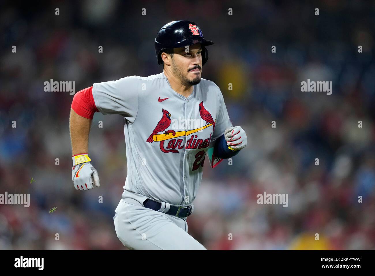 St. Louis Cardinals' Nolan Arenado runs to first base after hitting a ...