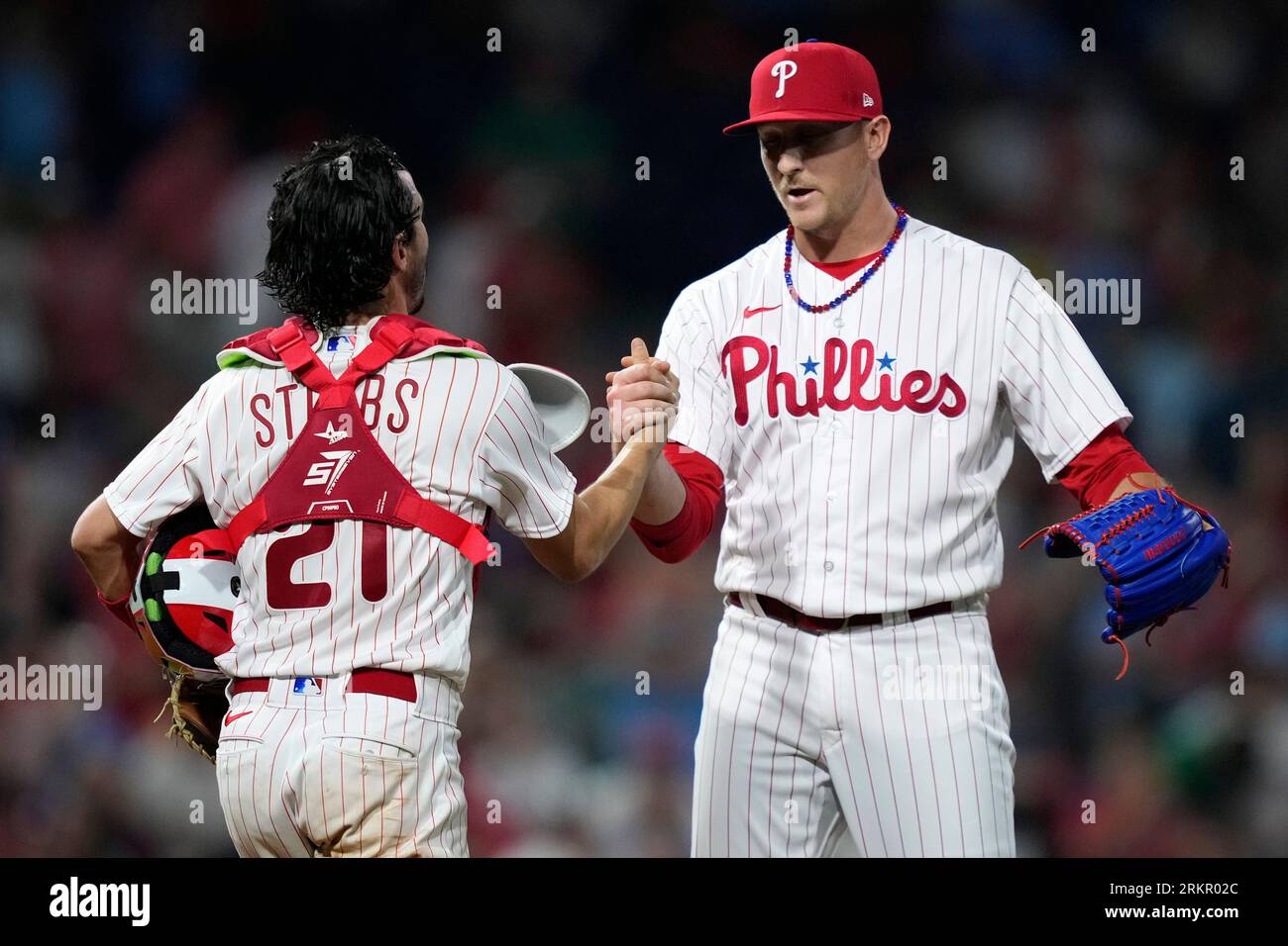 Philadelphia Phillies pitcher Jeff Hoffman, right, and catcher Garrett Stubbs celebrate after ...
