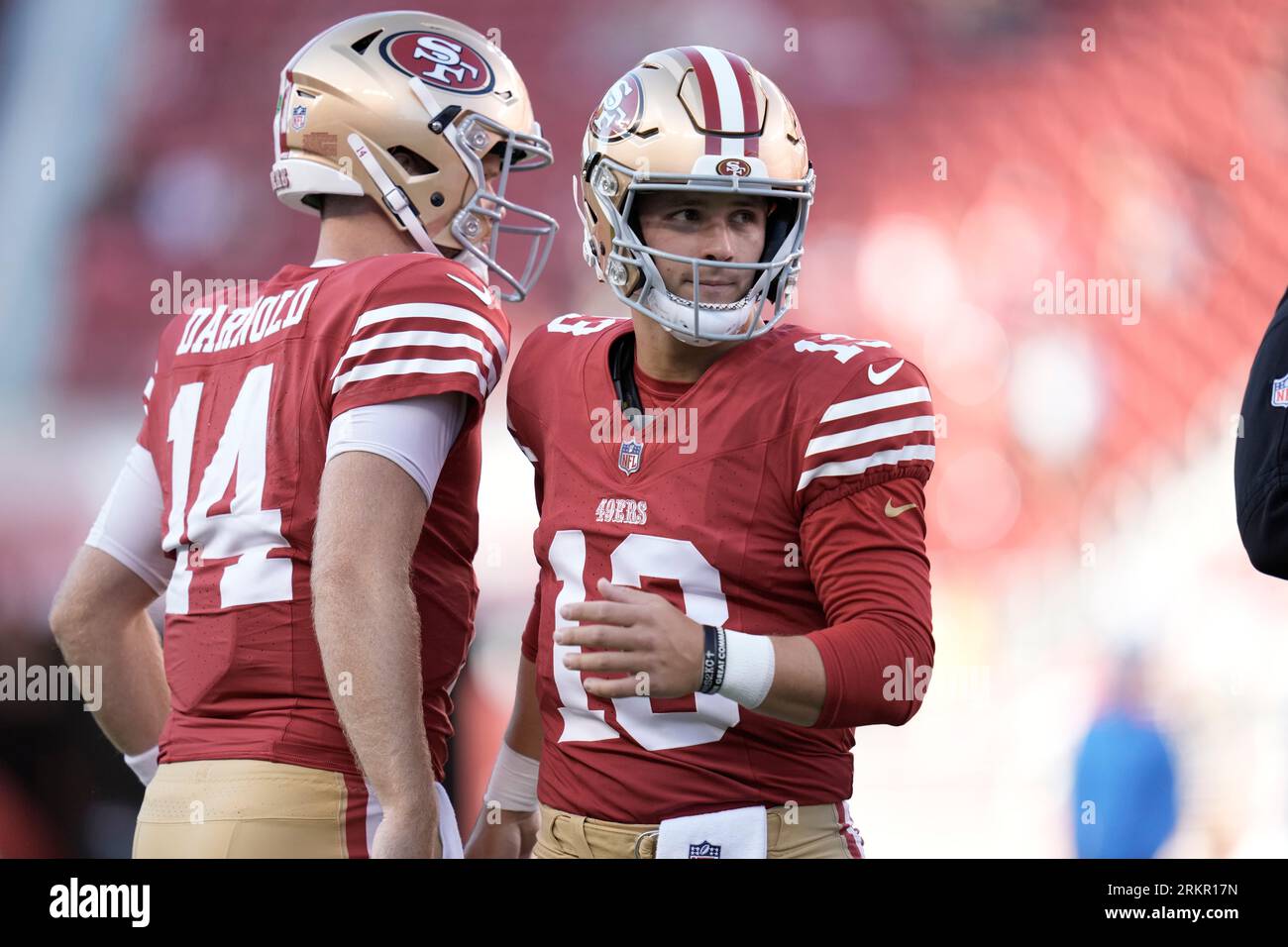 San Francisco 49ers quarterback Brock Purdy, right, talks to ...