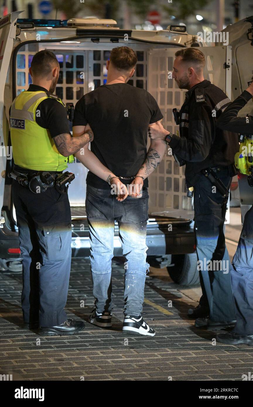 2 People Being Arrested