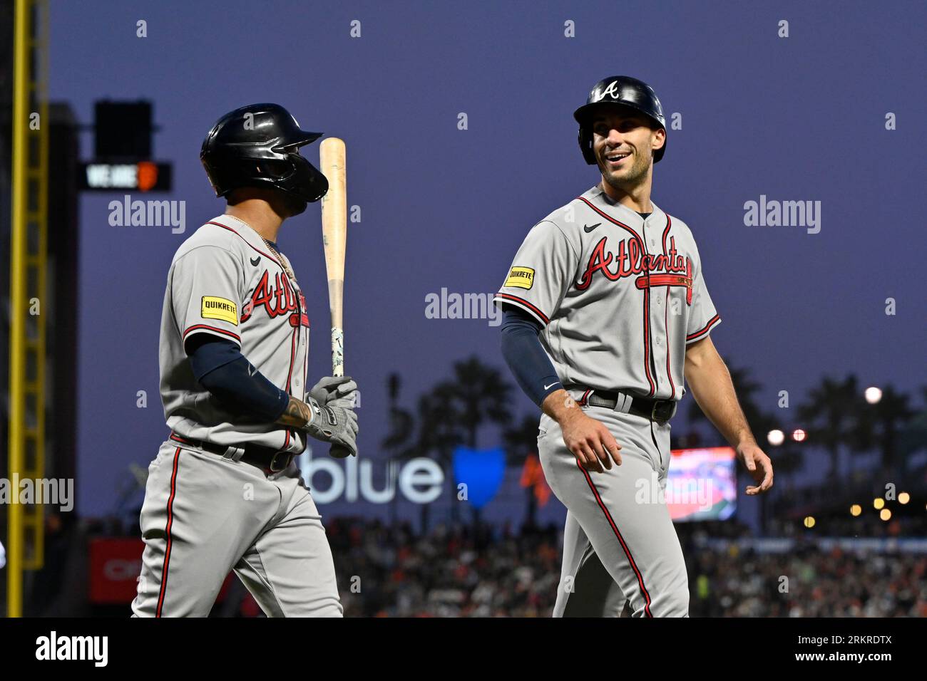 Atlanta Braves' Matt Olson, right, smiles at Eddie Rosario after Olson ...