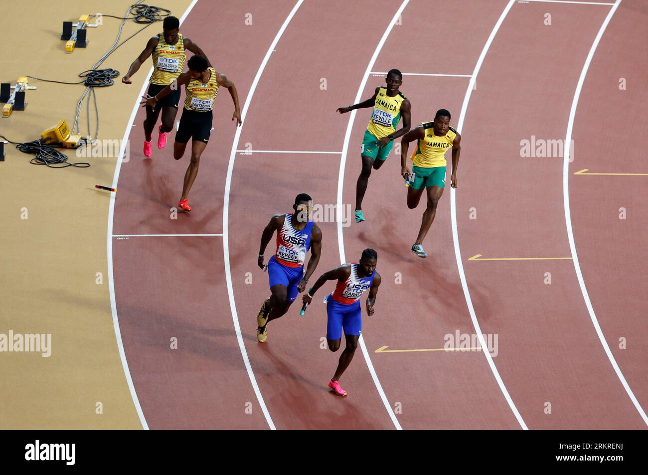 Budapest, L) of Germany drop the baton during the men's 4x100m Relay ...
