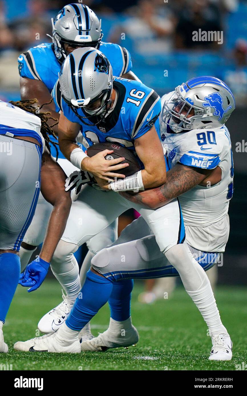 Carolina Panthers quarterback Jake Luton is sacked by Detroit Lions ...