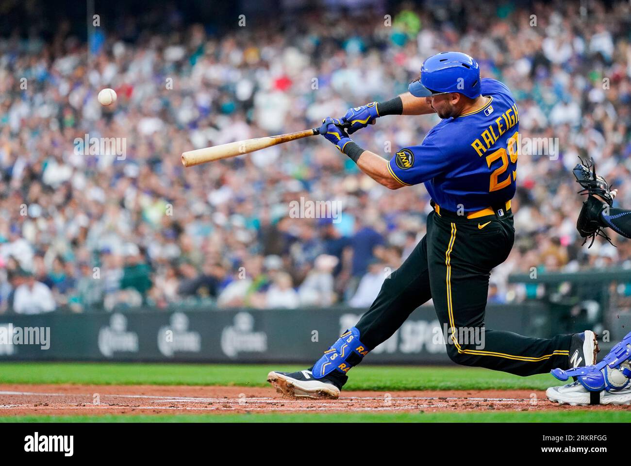 Seattle Mariners' Cal Raleigh hits an RBI single to score Julio ...
