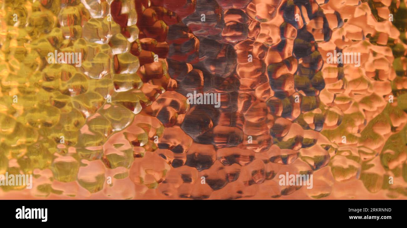 Reflected Colors on a Shiny Hammered Copper Surface Stock Photo - Alamy