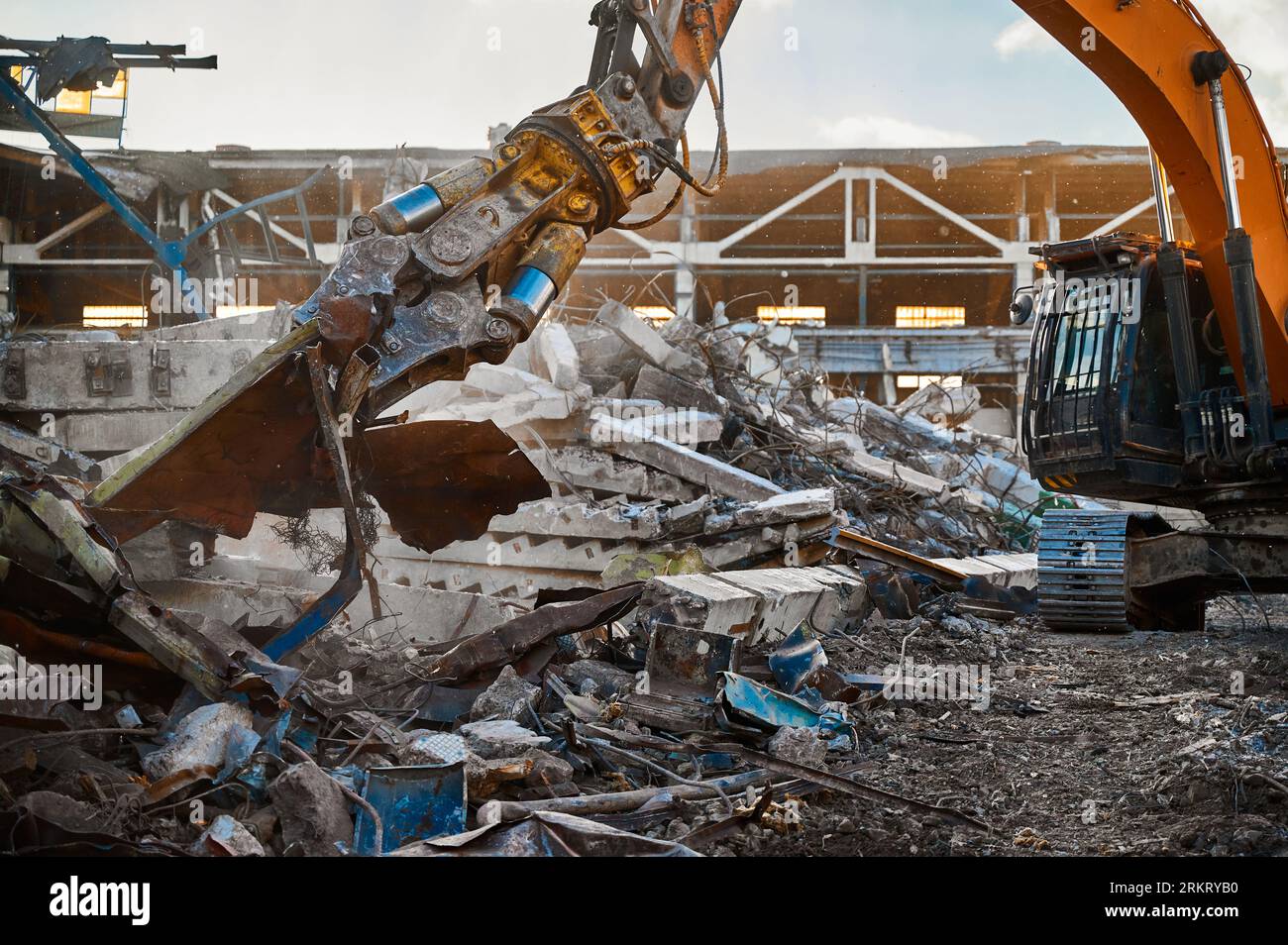 Hydraulic excavator removes concrete hi-res stock photography and ...