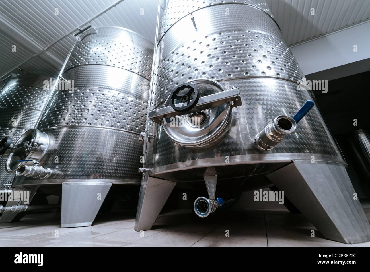 Modern winery with stell barrels Stock Photo - Alamy