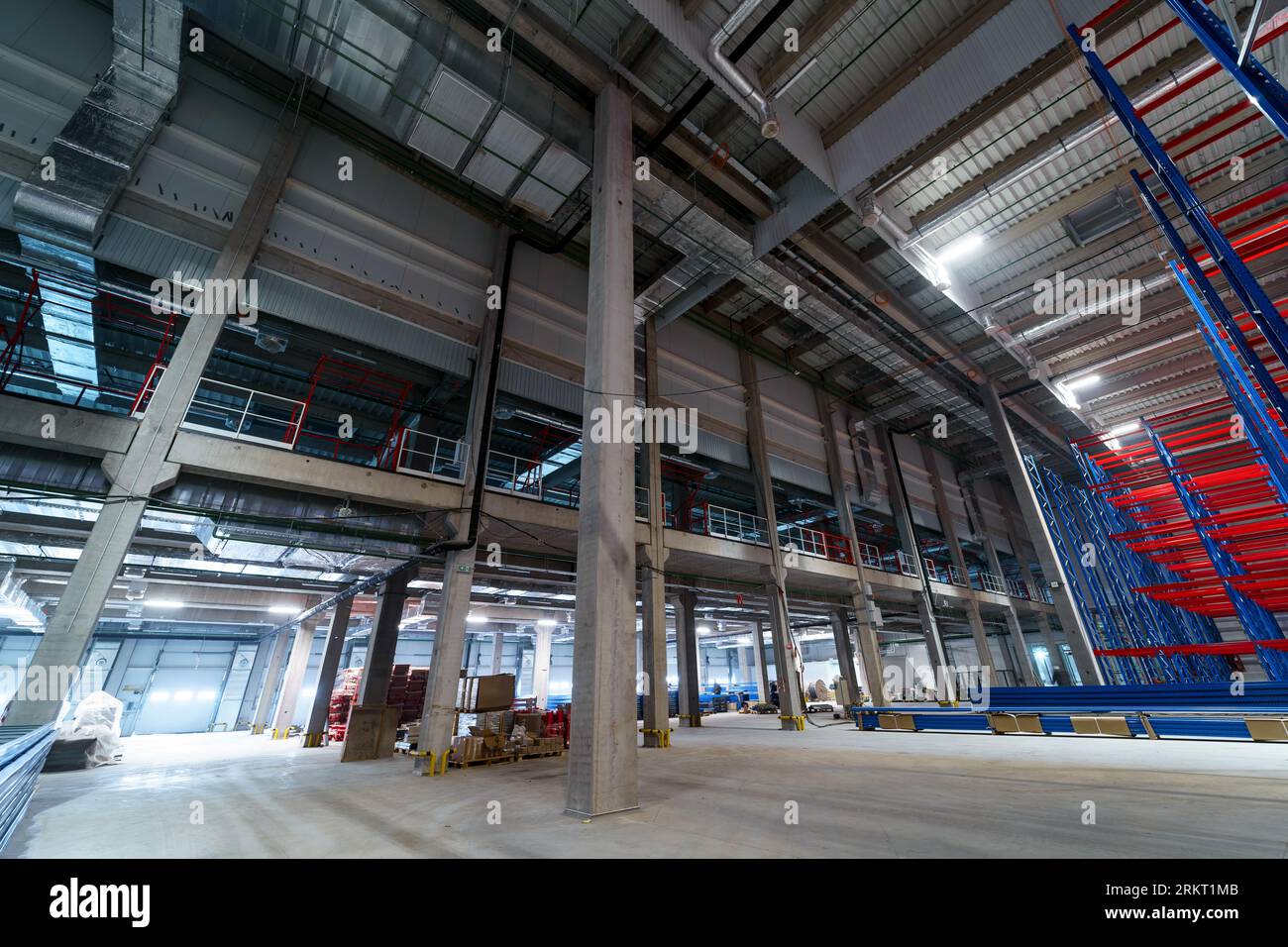 Interior of an industrial building. Huge warehouse under construction ...