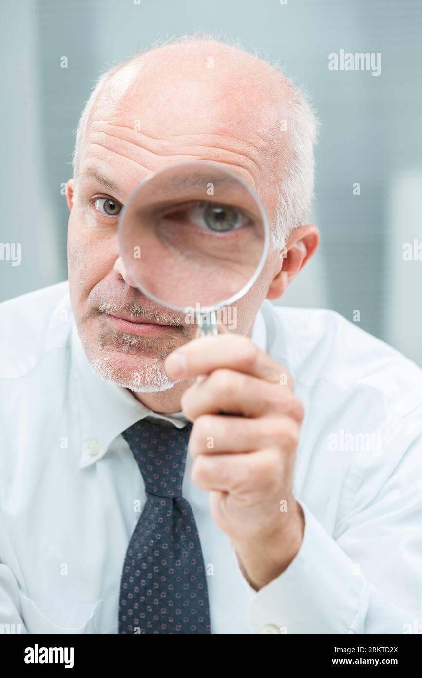 Scrutinize details hi-res stock photography and images - Alamy