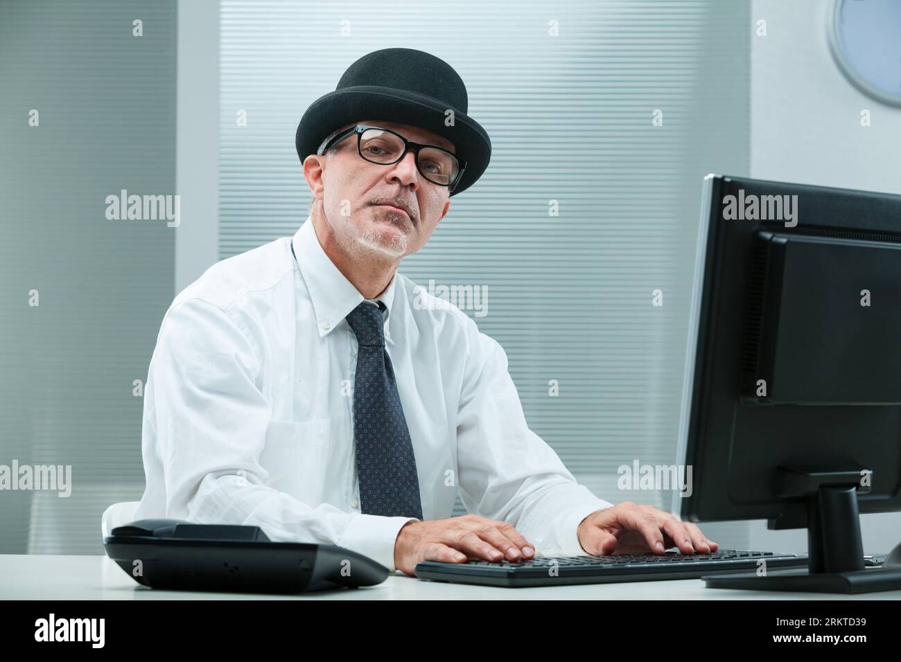 Man bowler hat computer hi-res stock photography and images - Alamy