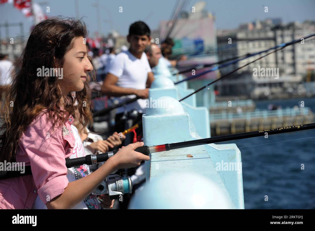 Girl who fishes hi-res stock photography and images - Alamy