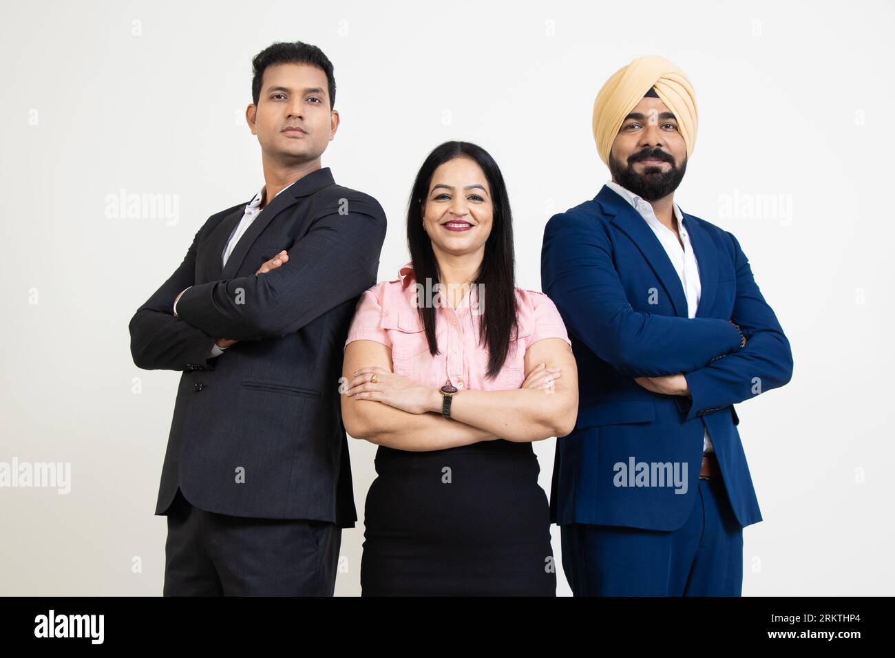 Group of positive indian business people wearing suit standing cross ...