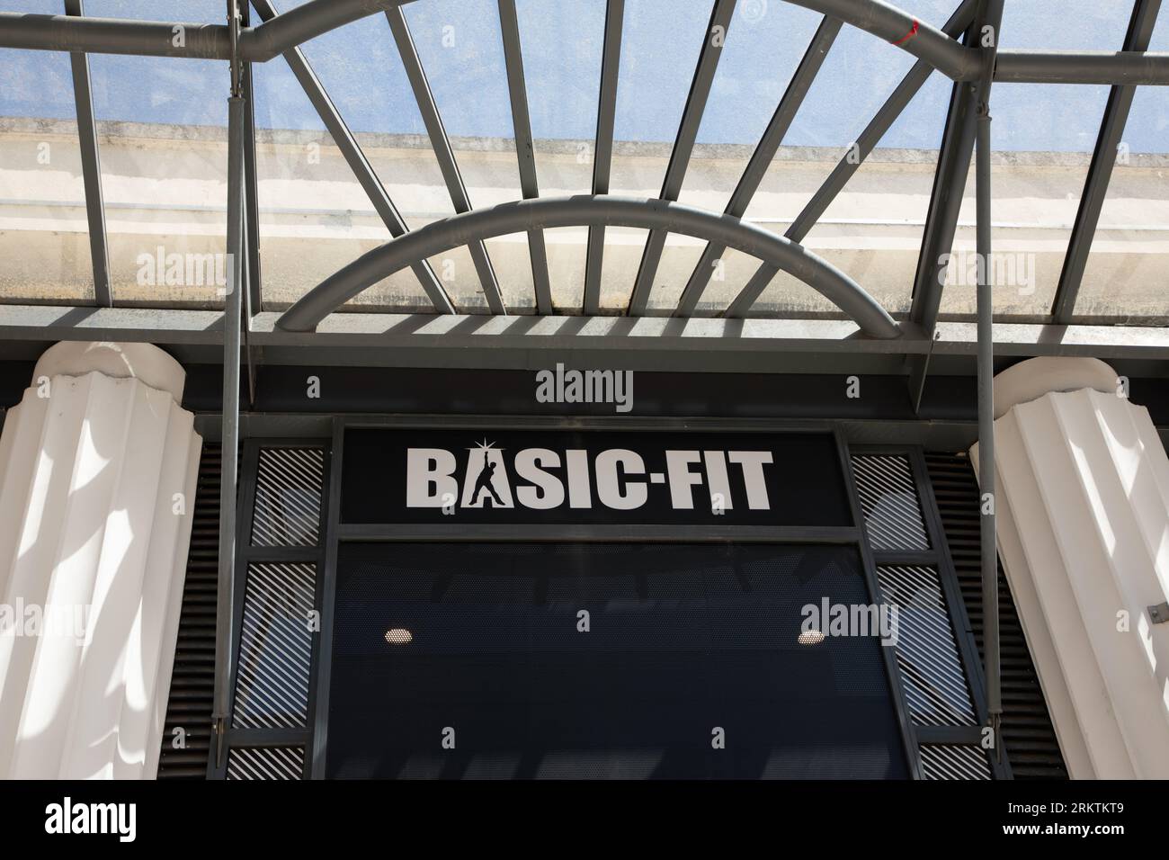 Pau , France - 08 17 2023 : Basic-Fit facade sport fitness club sign ...