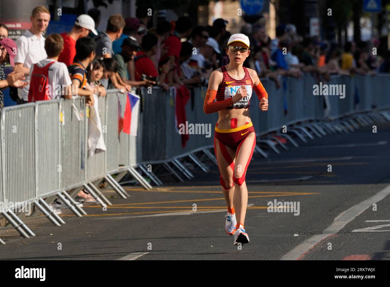 Zhang Deshun, of China, competes in the women's marathon during the ...