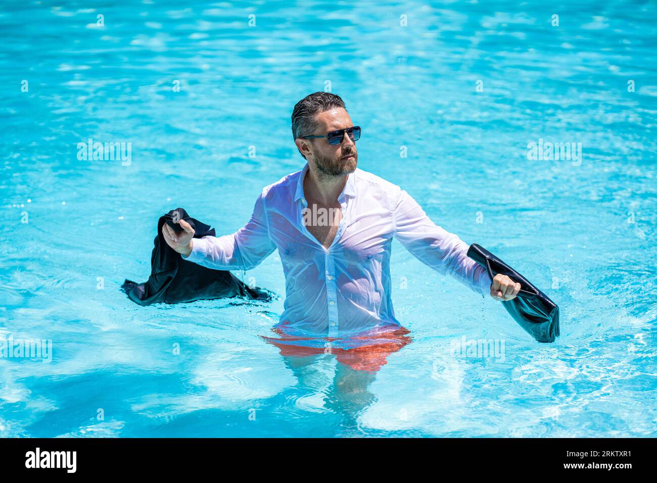 Businessman in swimming pool. business man on summer vacation. Business ...