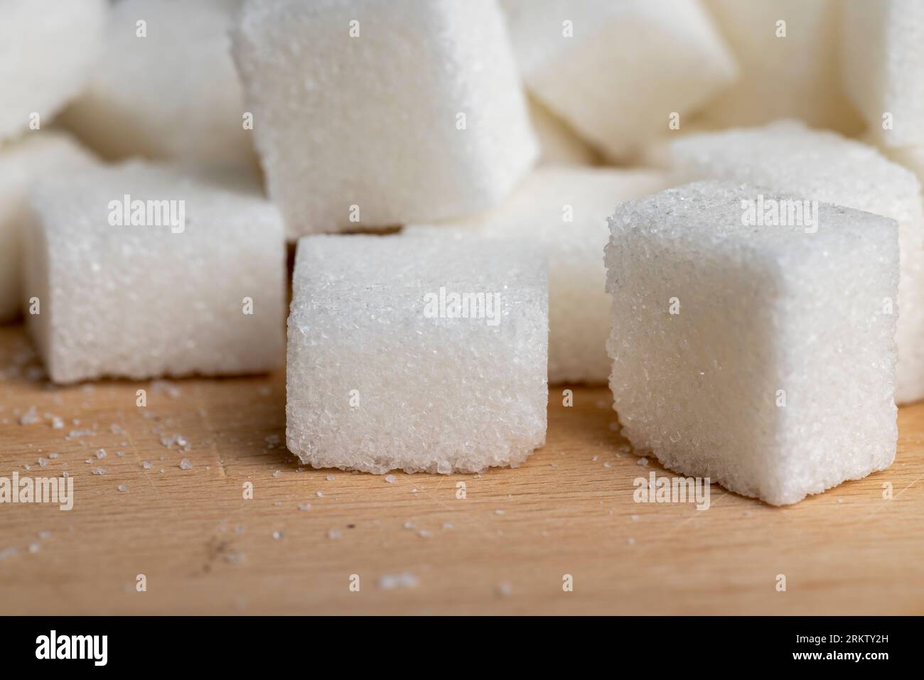 White sugar made from beetroot, cubes of white beet sugar close-up ...