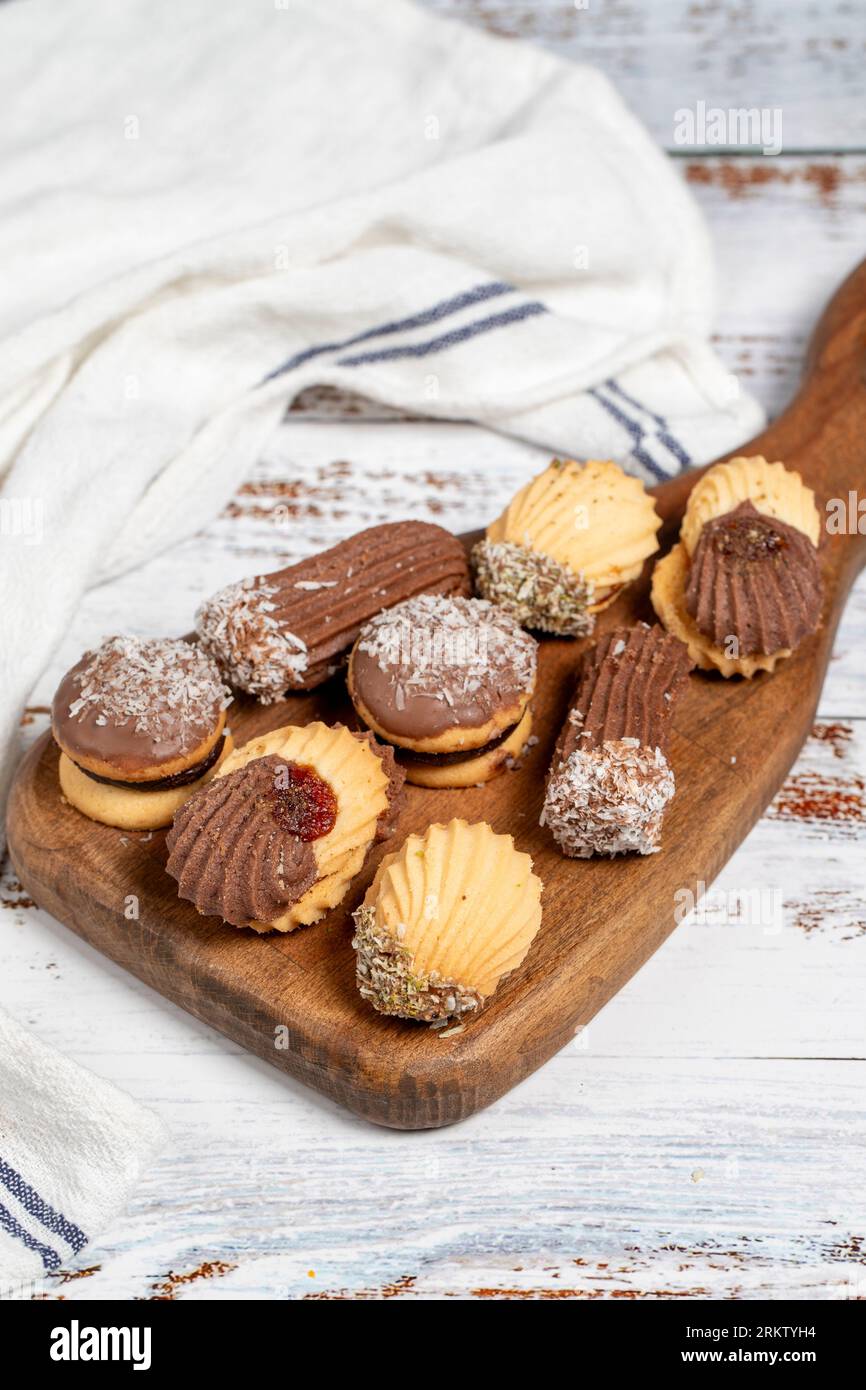 Types of cookies. Assortment of fresh delicious patisserie cookies on a ...