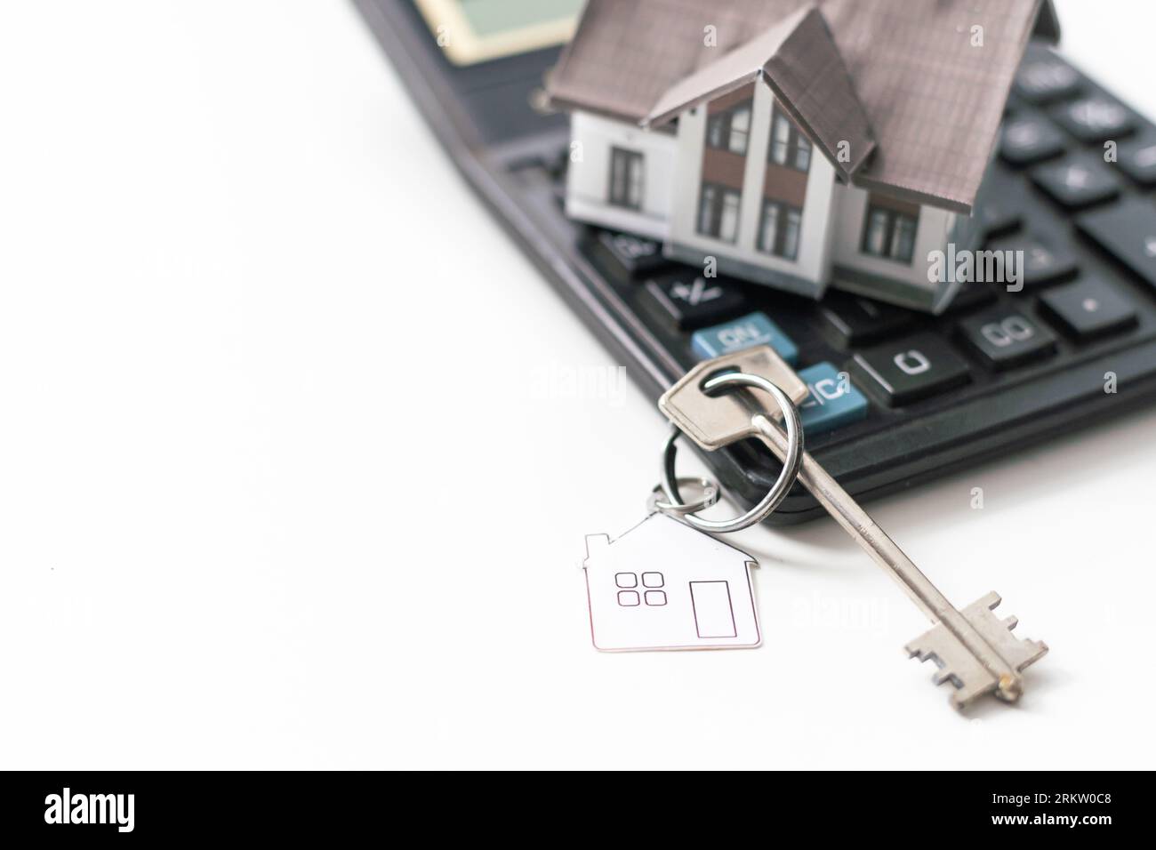 House key with house model keychain on house layout plan Stock Photo ...