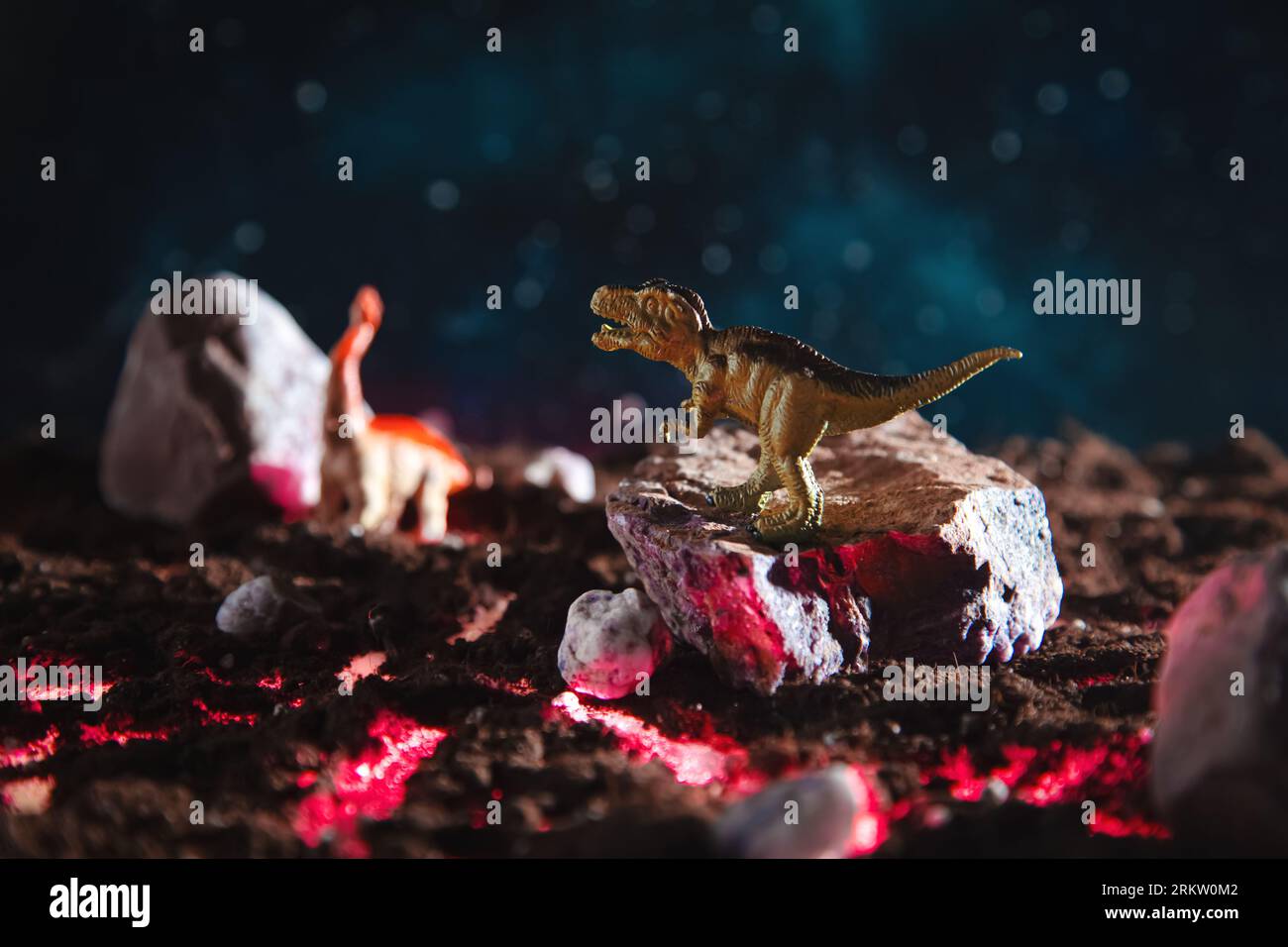 Tyrannosaurus on a stone escapes from burning lava. Creative burning ...