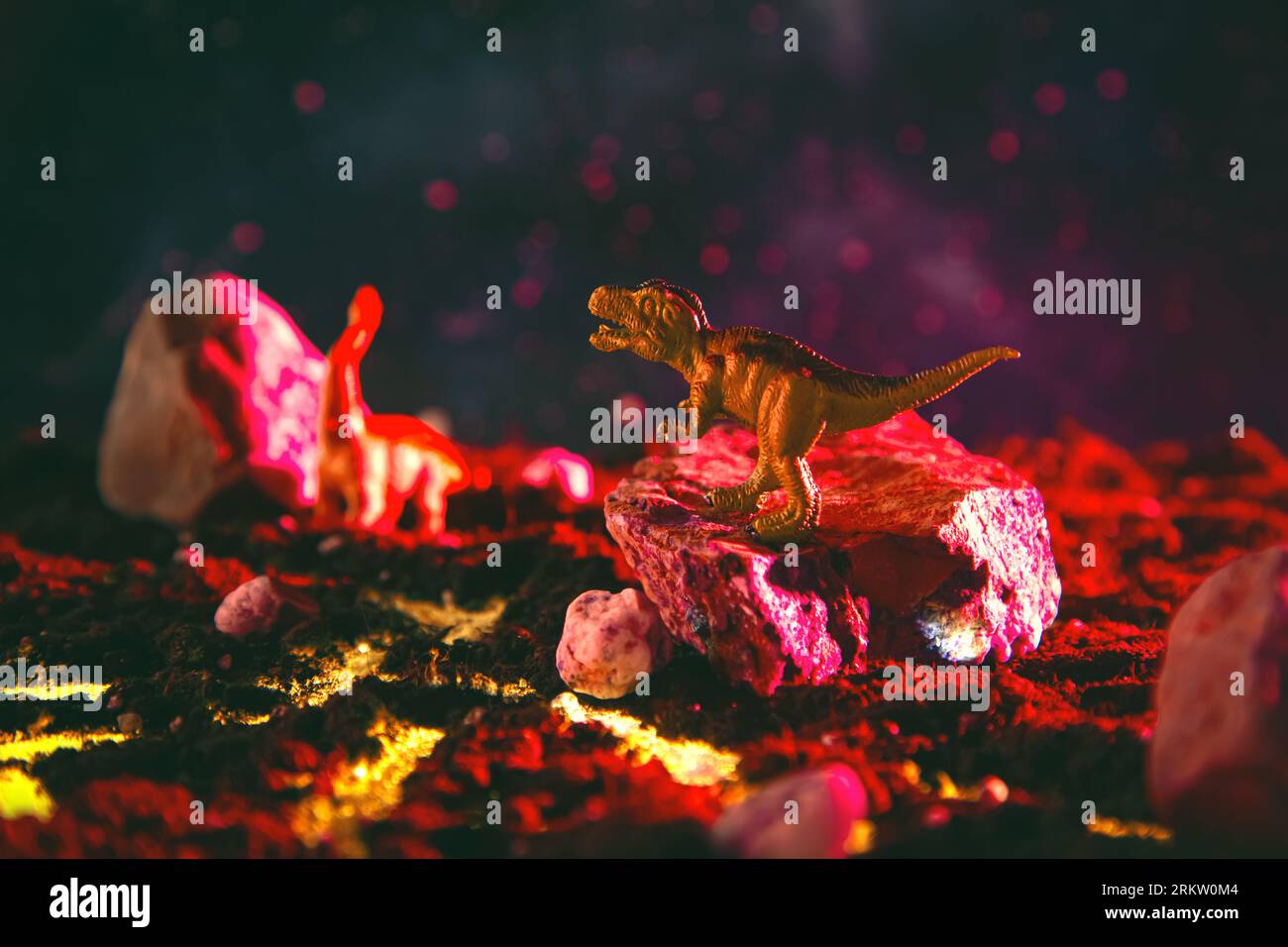 Tyrannosaurus on a stone escapes from burning lava. Creative burning ...