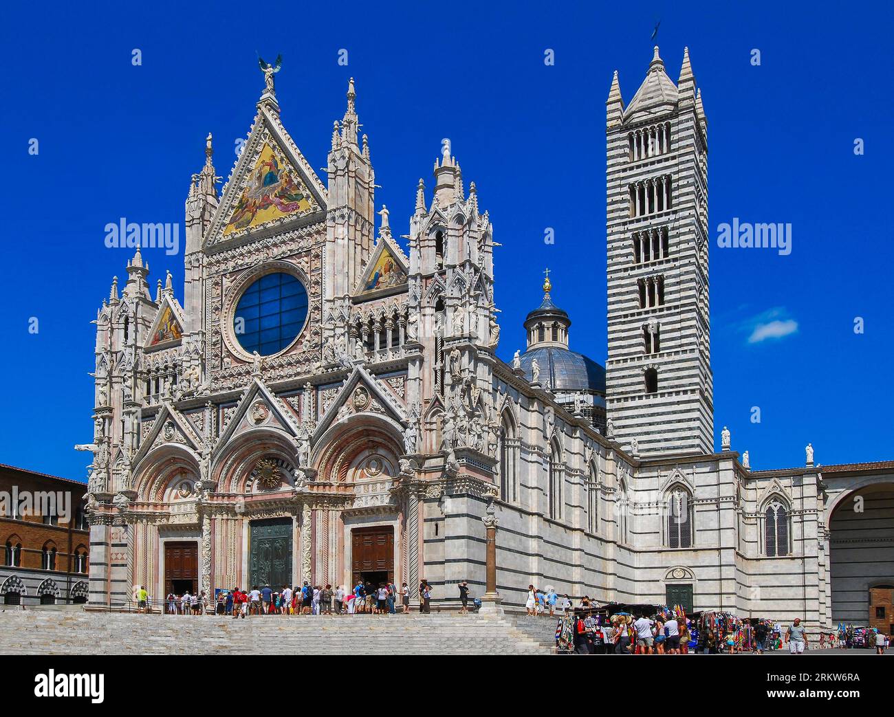 The magnificently decorated Duomo of Siena, with its black and white ...